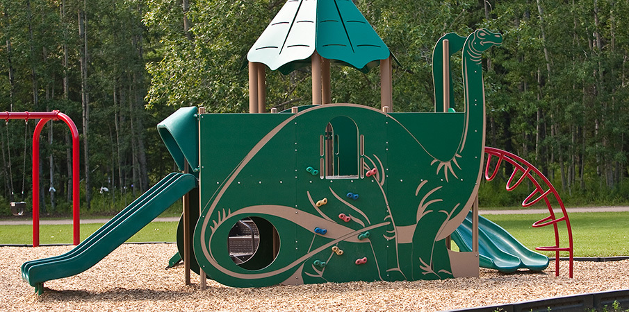 Pipestone Creek Dinosaur Playground – Themed playground