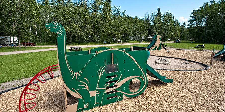 Pipestone Creek Dinosaur Playground – Themed playground